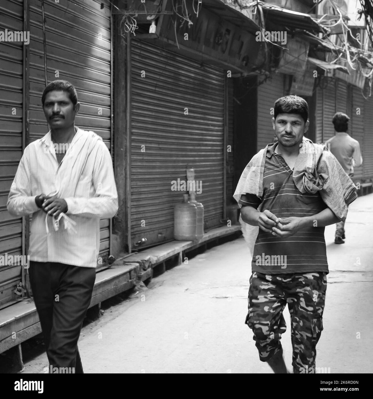 Old Delhi, India, April 15, 2022 - Unidentified group of men walking ...