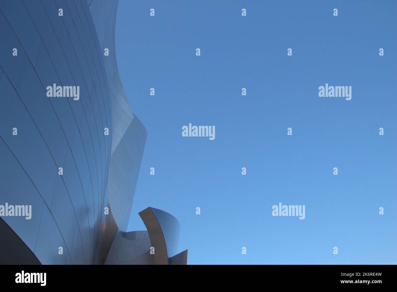 Architecture, organic surface, with an abstract shape with the sky in ...