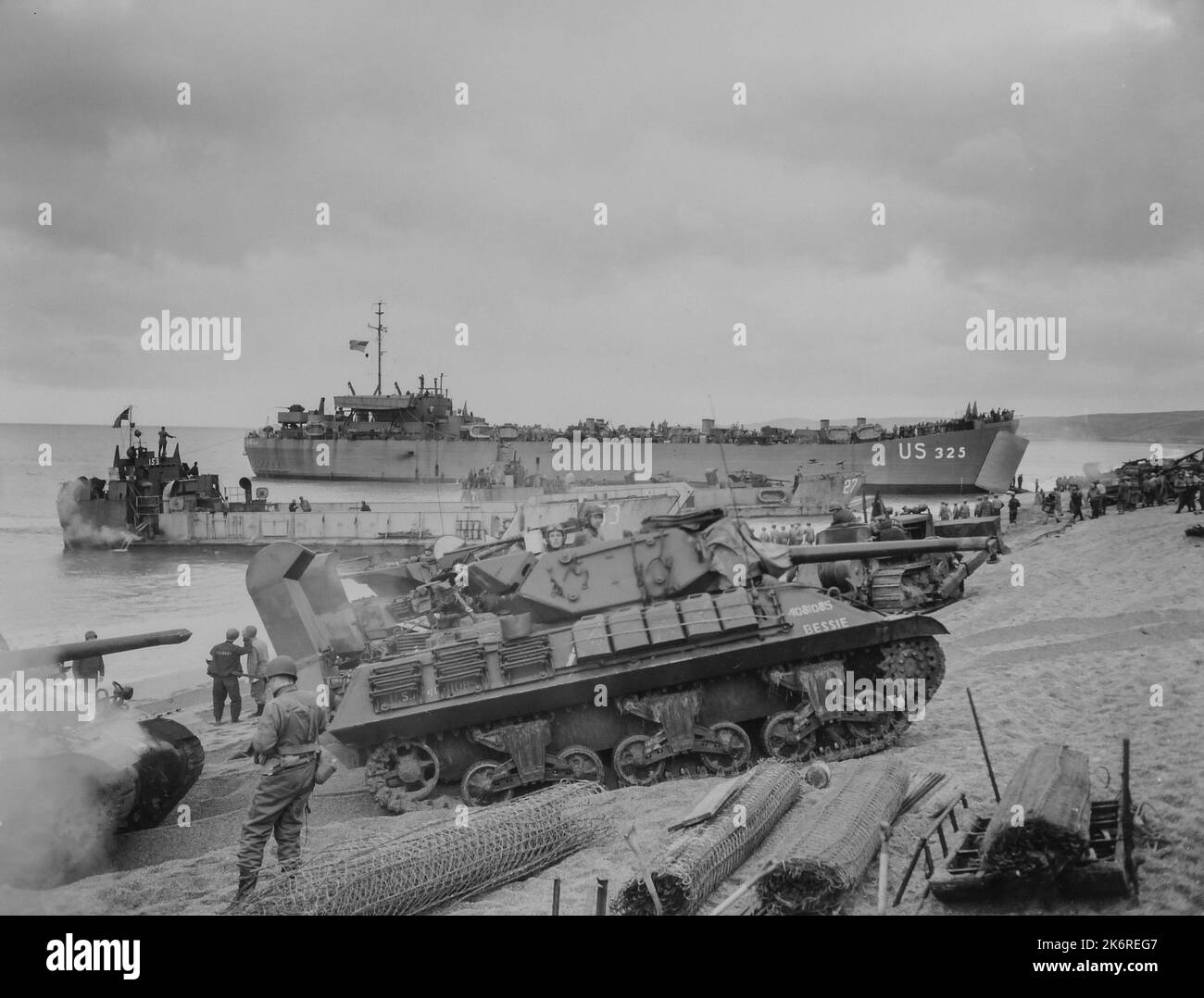Photograph of Medium Tanks Unloading with LCT-153 and LST-325 in ...