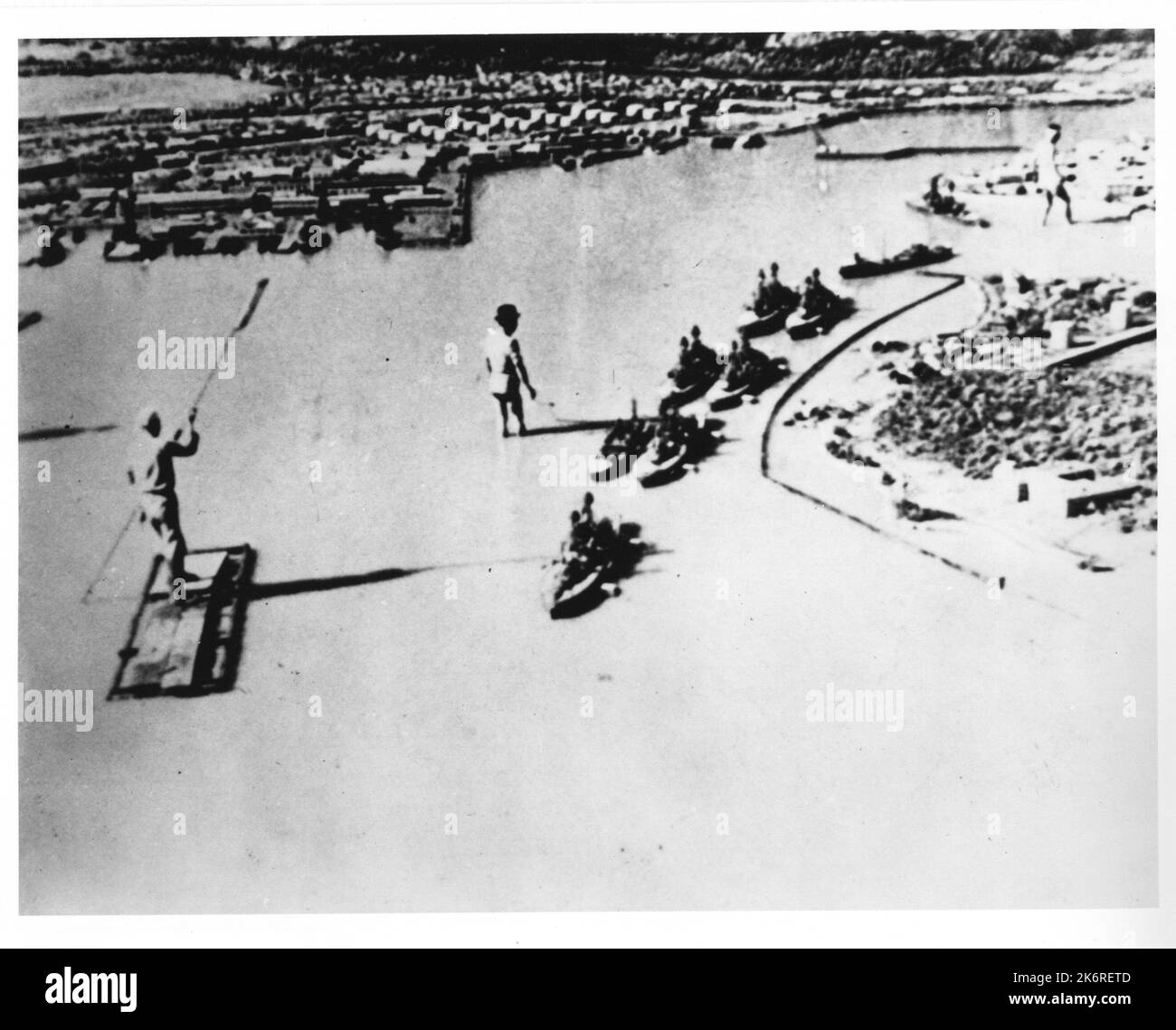 Photograph of Japanese Wasing in Pool with Mockup of Ford Island and ...