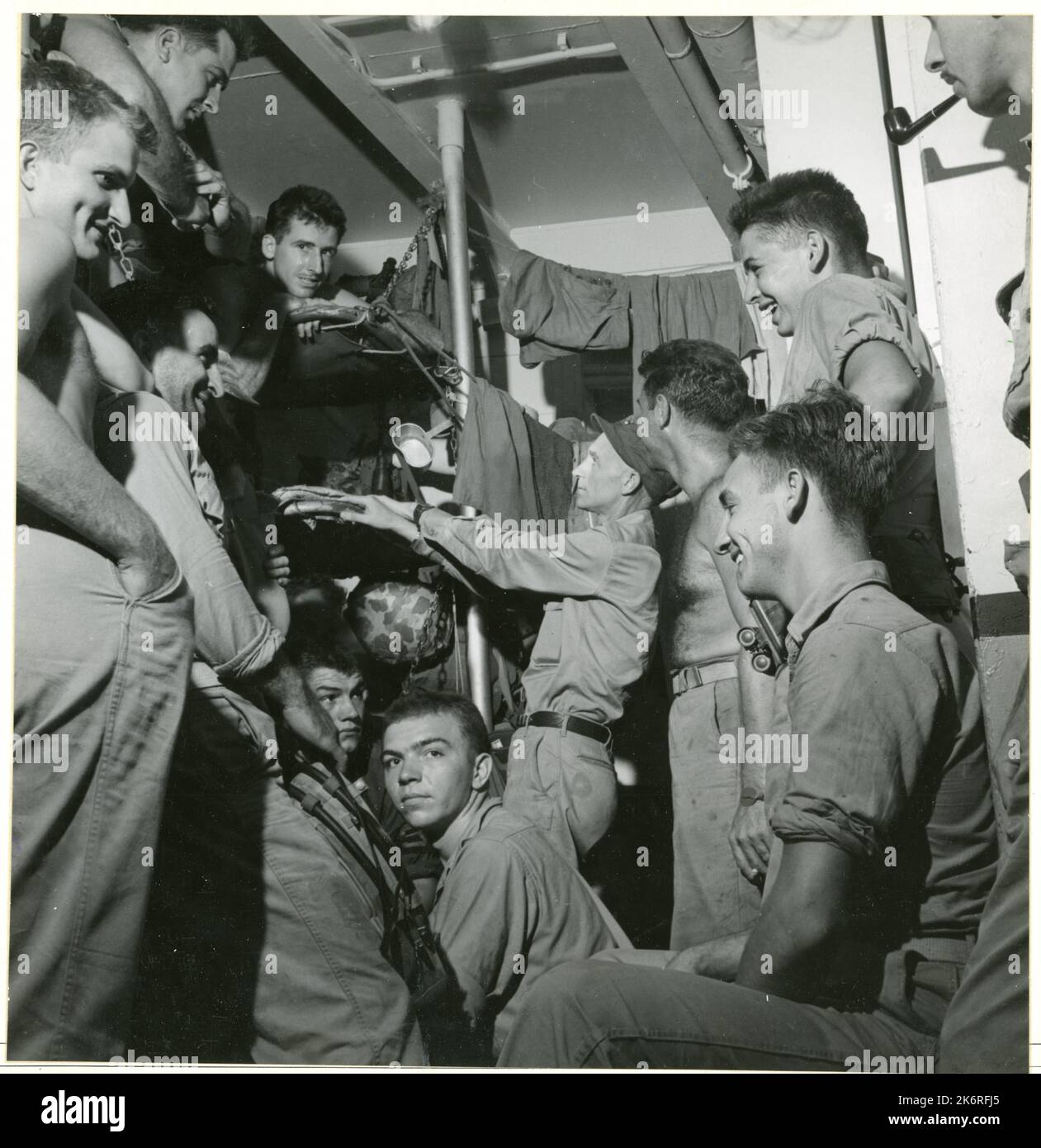 Photograph of Ernie Pyle Visiting with Marines on the USS Charles ...