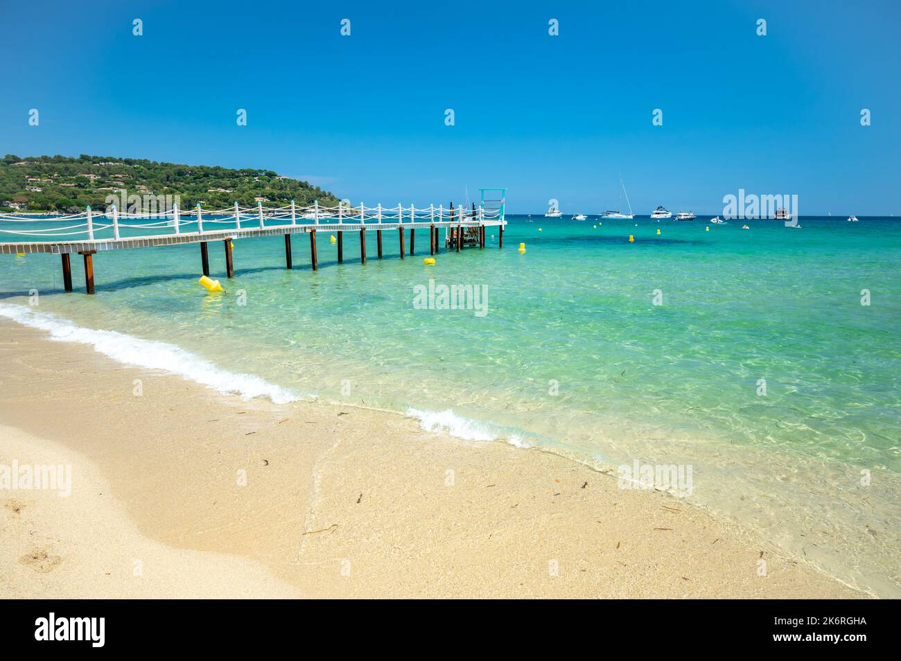 Wooden pier for guests of yachts on legendary Pampelonne beach near ...