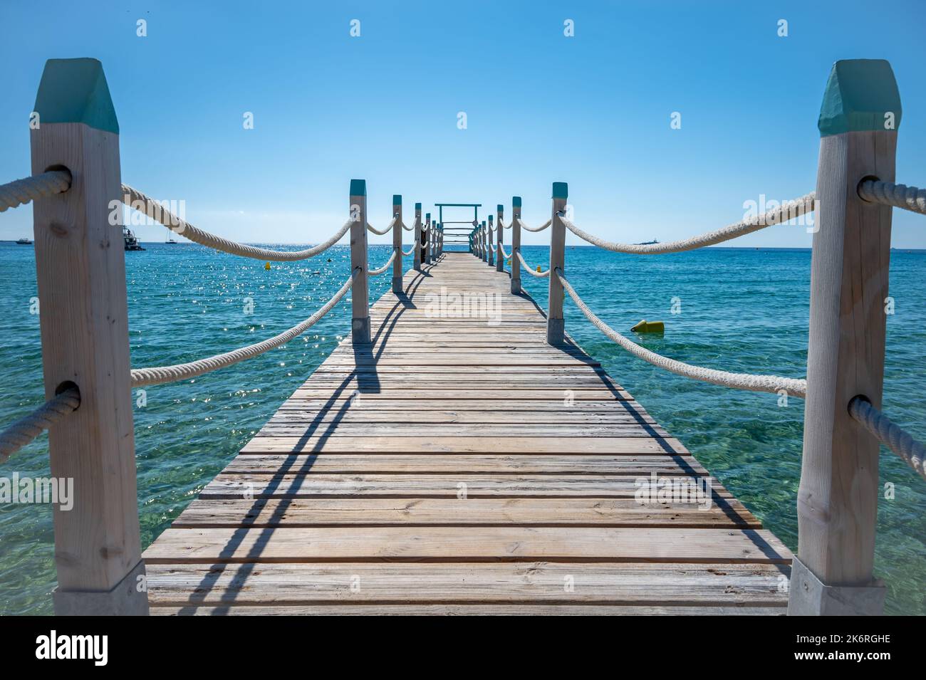 Wooden pier for guests of yachts on legendary Pampelonne beach near ...