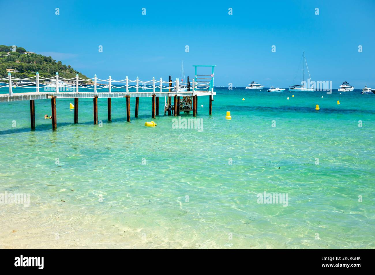 Wooden pier for guests of yachts on legendary Pampelonne beach near ...