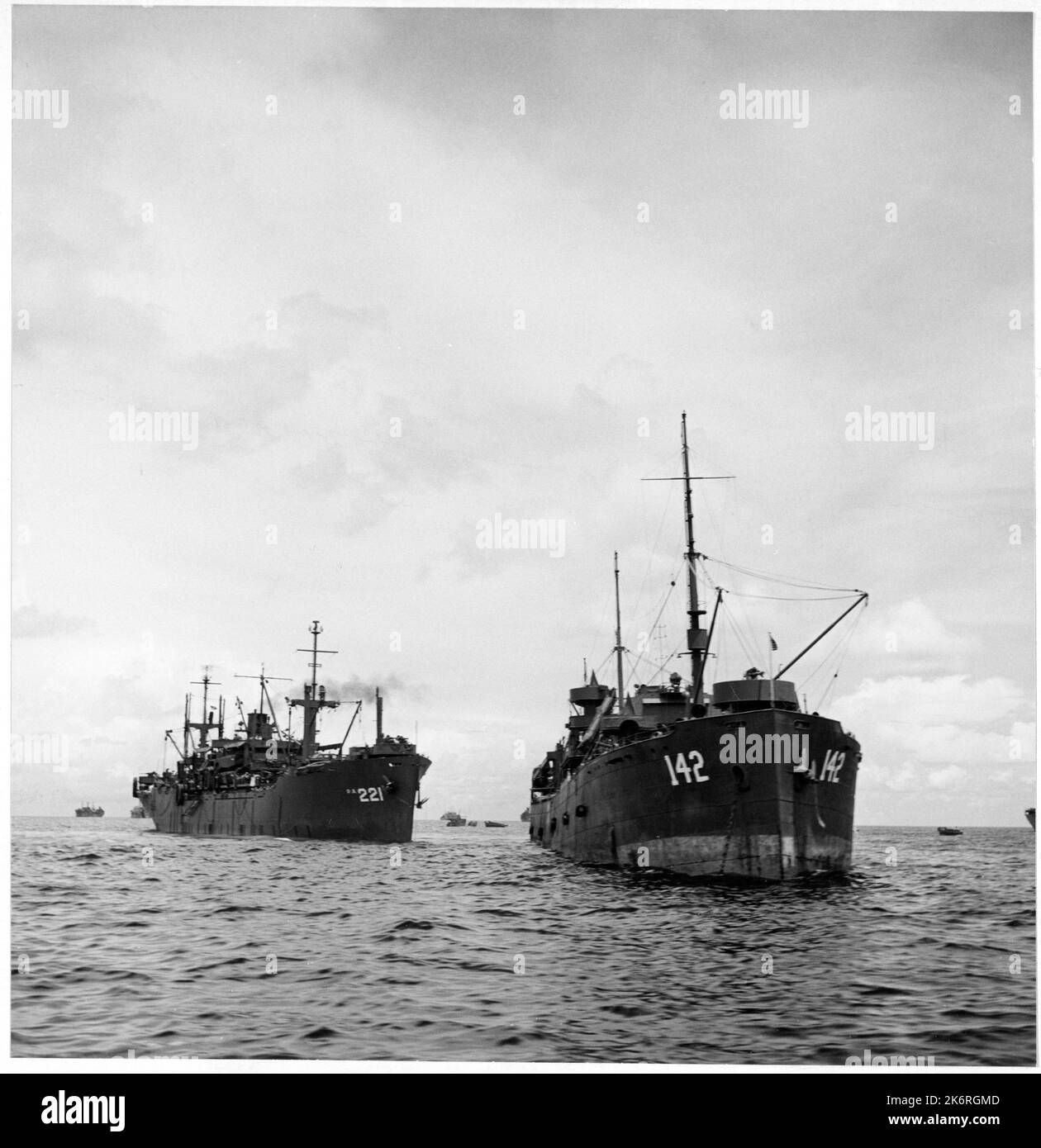 Photograph of the USS Oneida (APA-221) and the USS Signal (IX-142) in ...