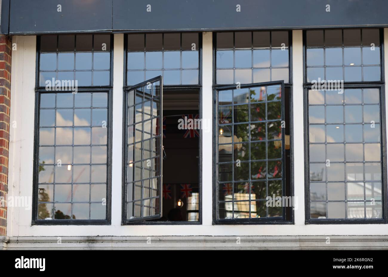 Characteristic architecture of windows of a London building Stock Photo ...