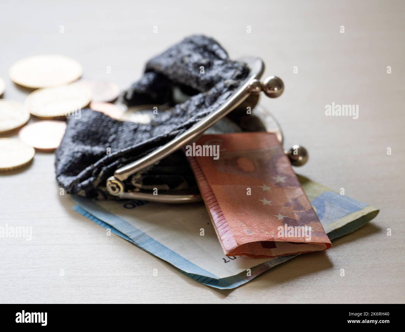 Torn money purse hi-res stock photography and images - Alamy