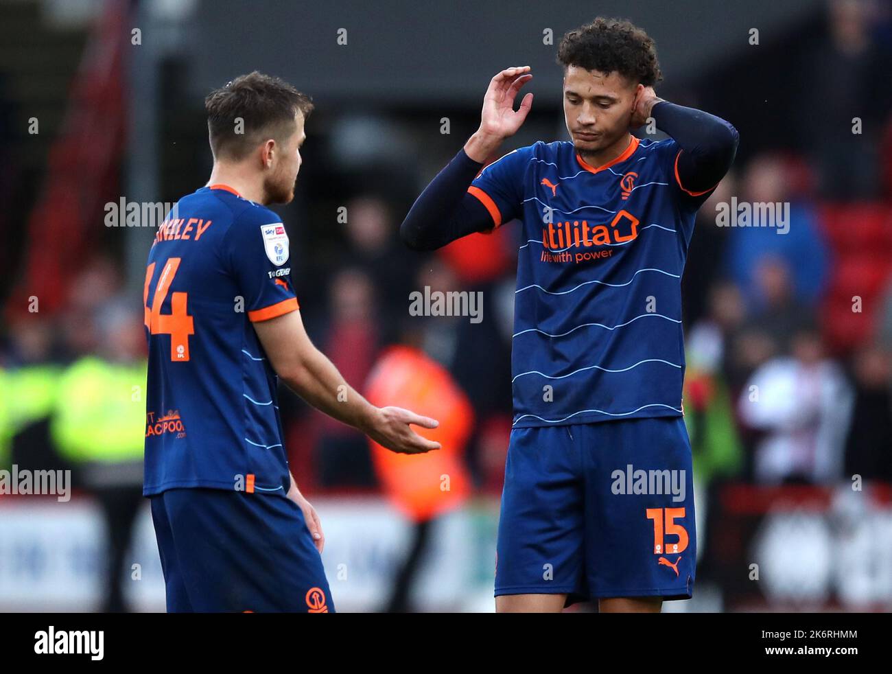 Blackpool's Rhys Williams (left) looks dejected during the Sky Bet ...
