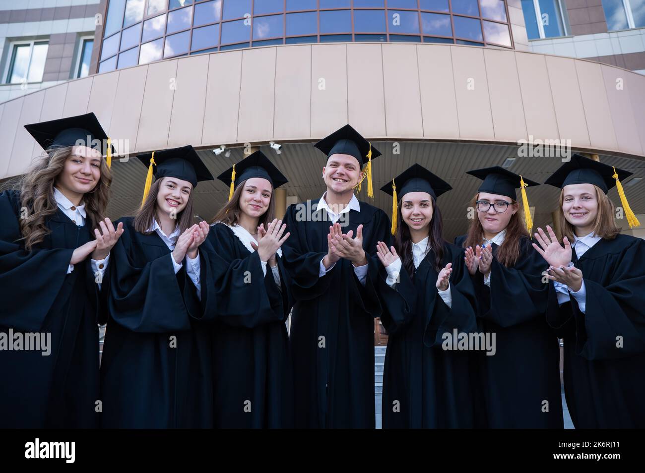 Group of seven graduates hi-res stock photography and images - Alamy