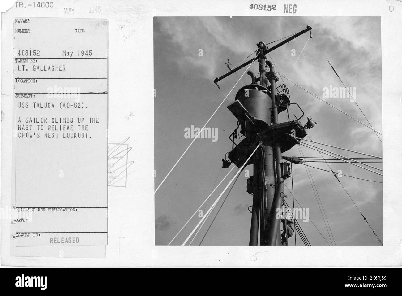 Photograph Taken on the USS Taluga (AO-62)"USS Taluga (AO-62). A sailor ...