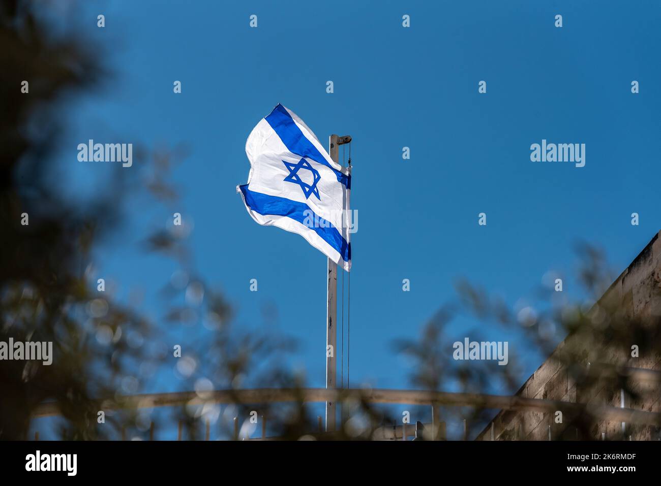 Large Israel flag waving in the wind. waving flag of israel white and ...