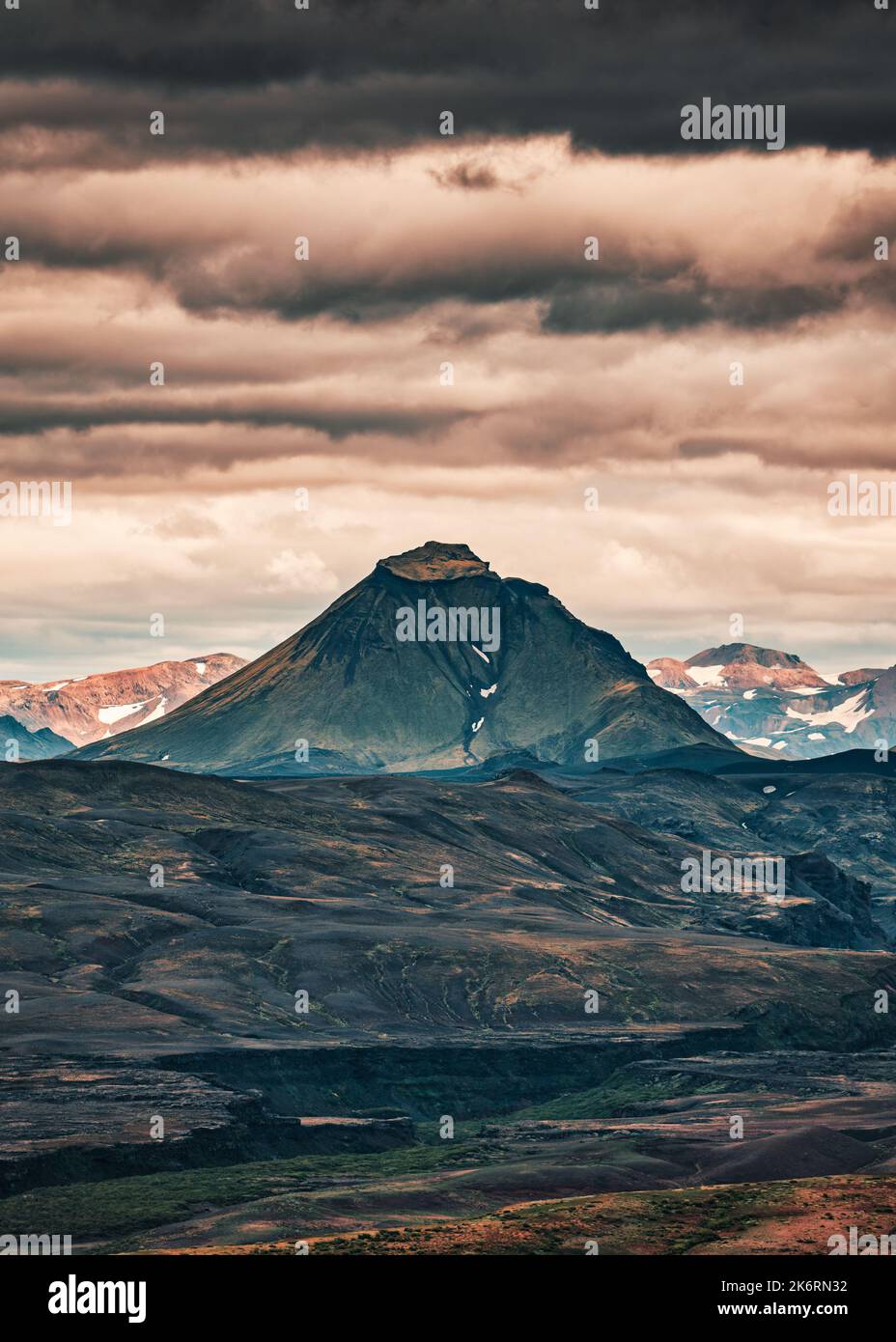 Volcano mountain on lava field and cloudy sky in Icelandic Highlands on ...