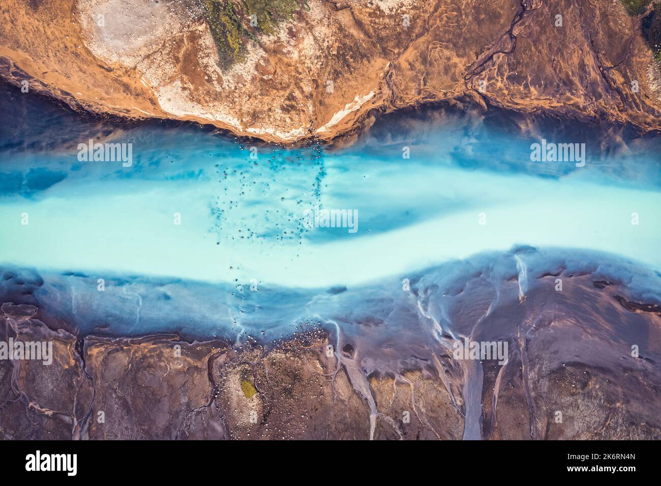 Top view of beautiful turquoise glacier river flowing melting in ...