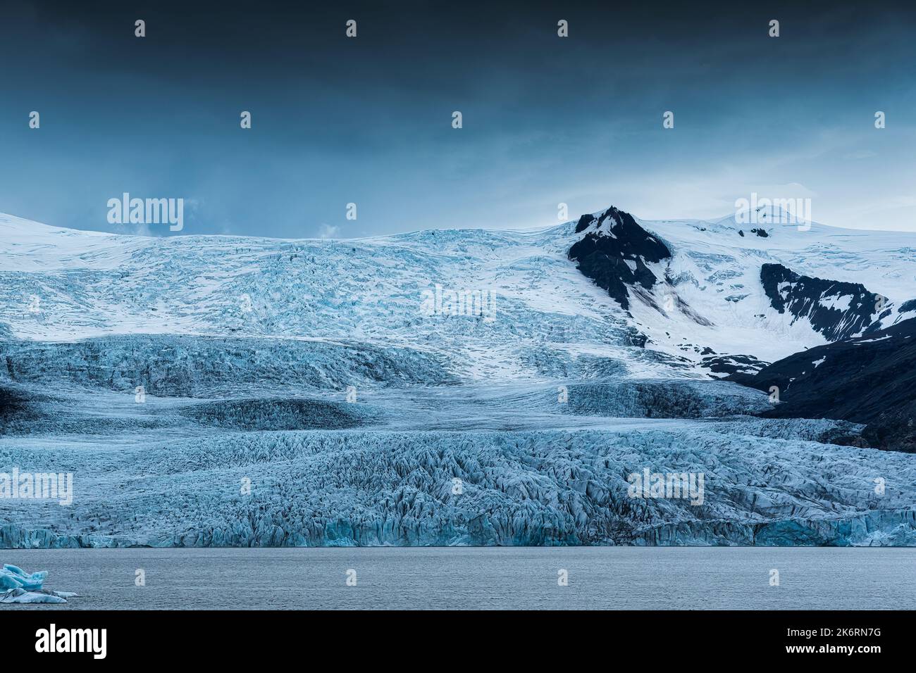 Large natural glacier and moody weather on summer in Iceland. Climate ...