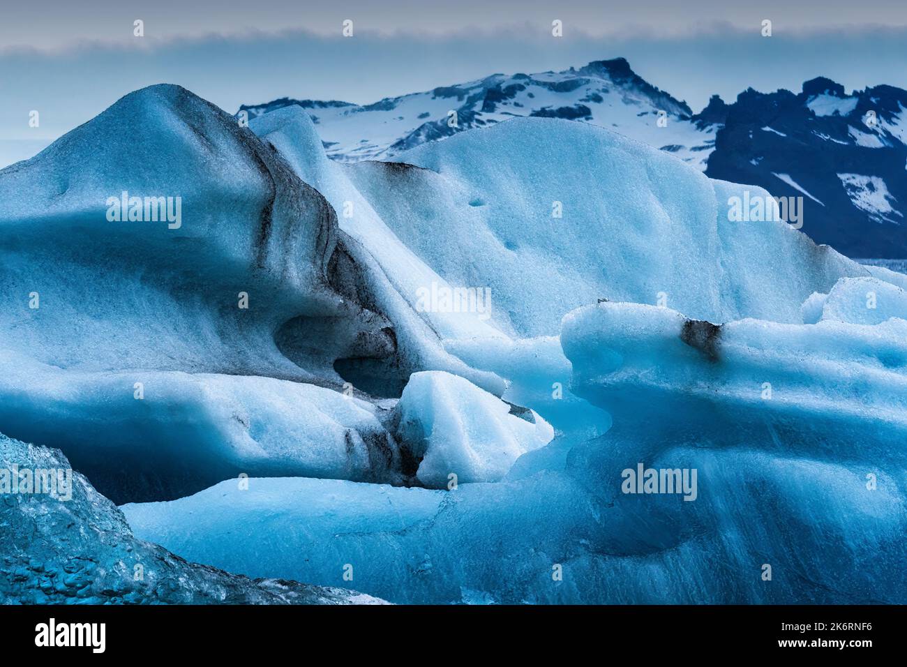 Abstract blue iceberg floating in Jokulsarlon glacier lagoon at ...