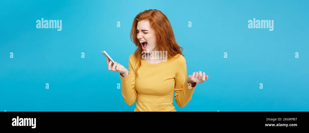 Lifestyle and Technology concept - Portrait of ginger red hair girl ...