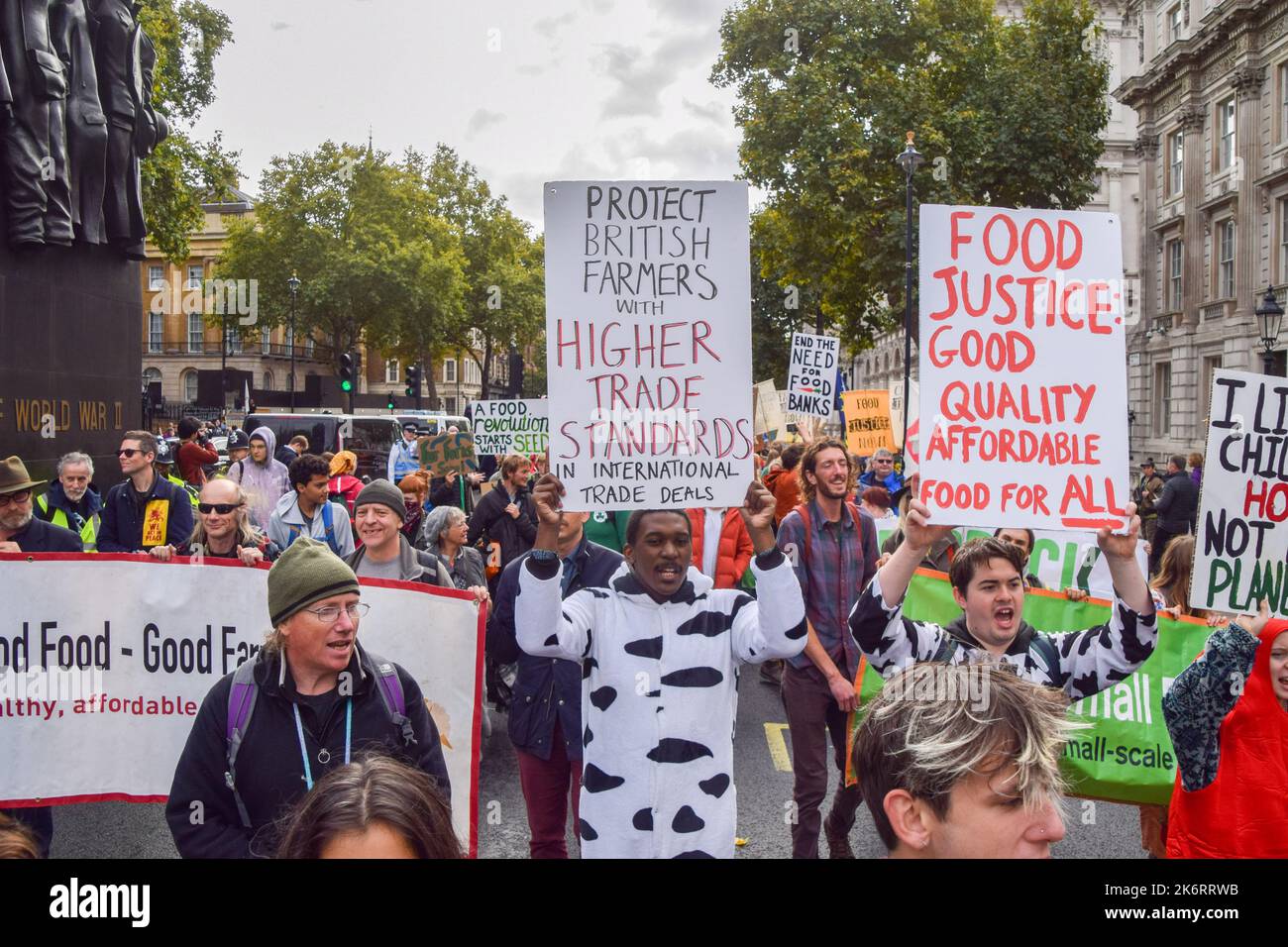 London, England, UK. 15th Oct, 2022. Protesters in cow costumes march ...