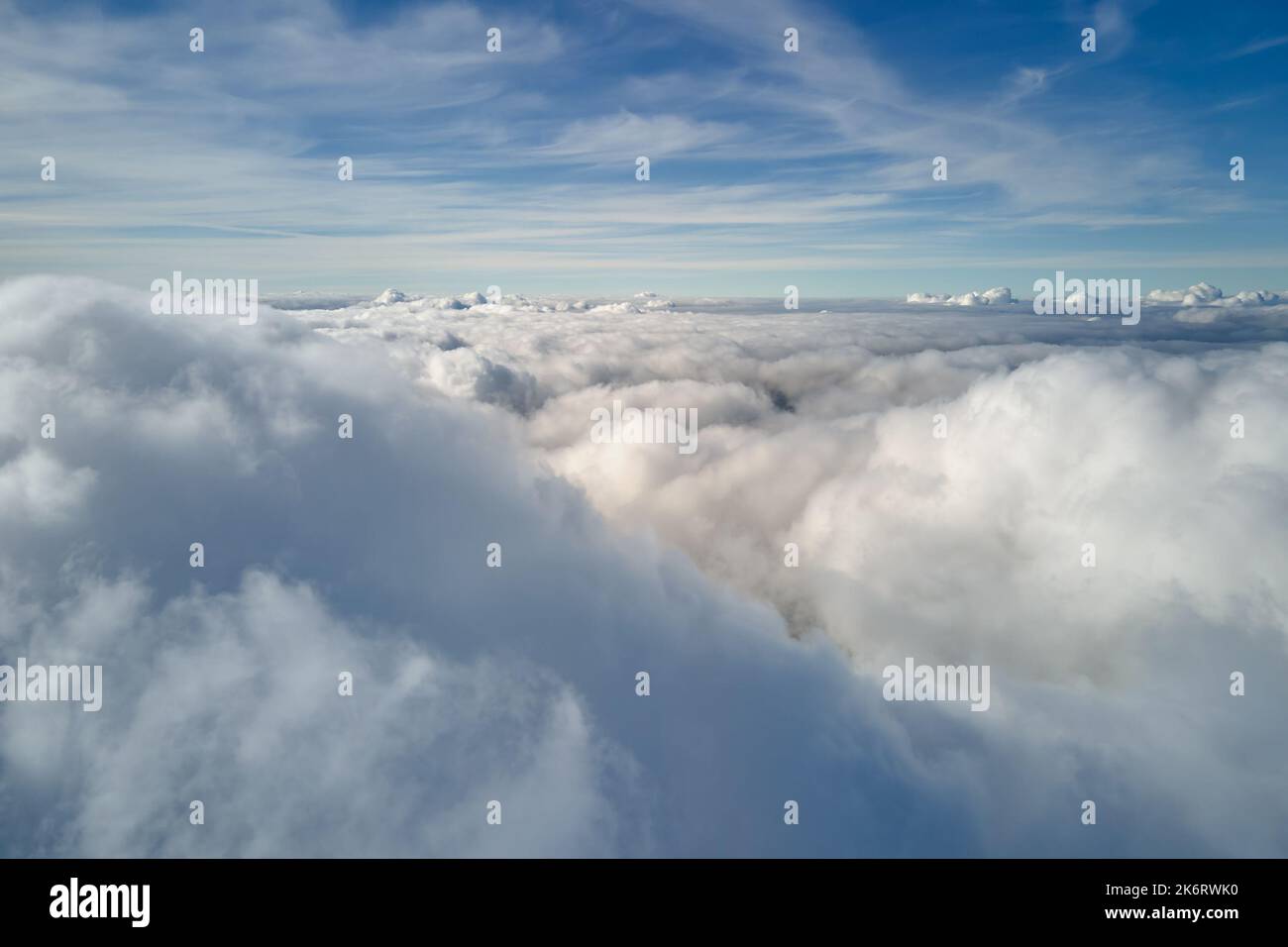 Aerial view from airplane window at high altitude of earth covered with ...