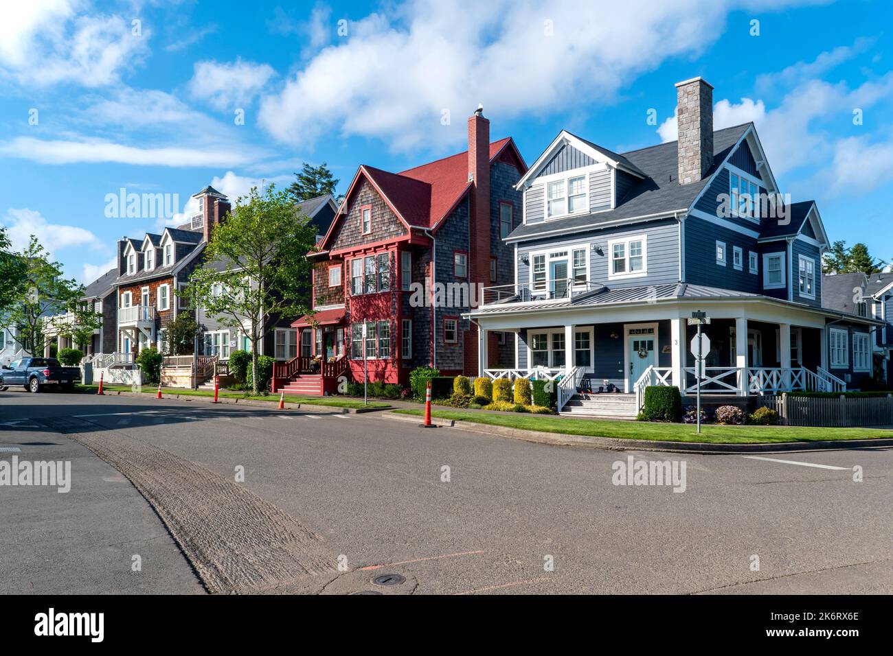 A row of colorful houses under a blue sky at Seabrook in Washington ...