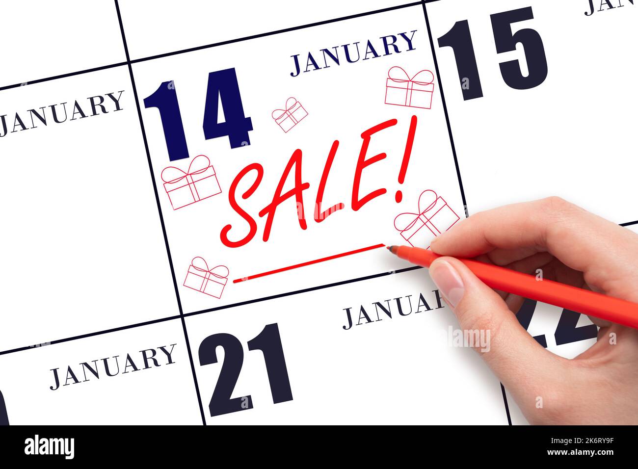 14th day of January. Hand writing text SALE and drawing gift boxes on ...