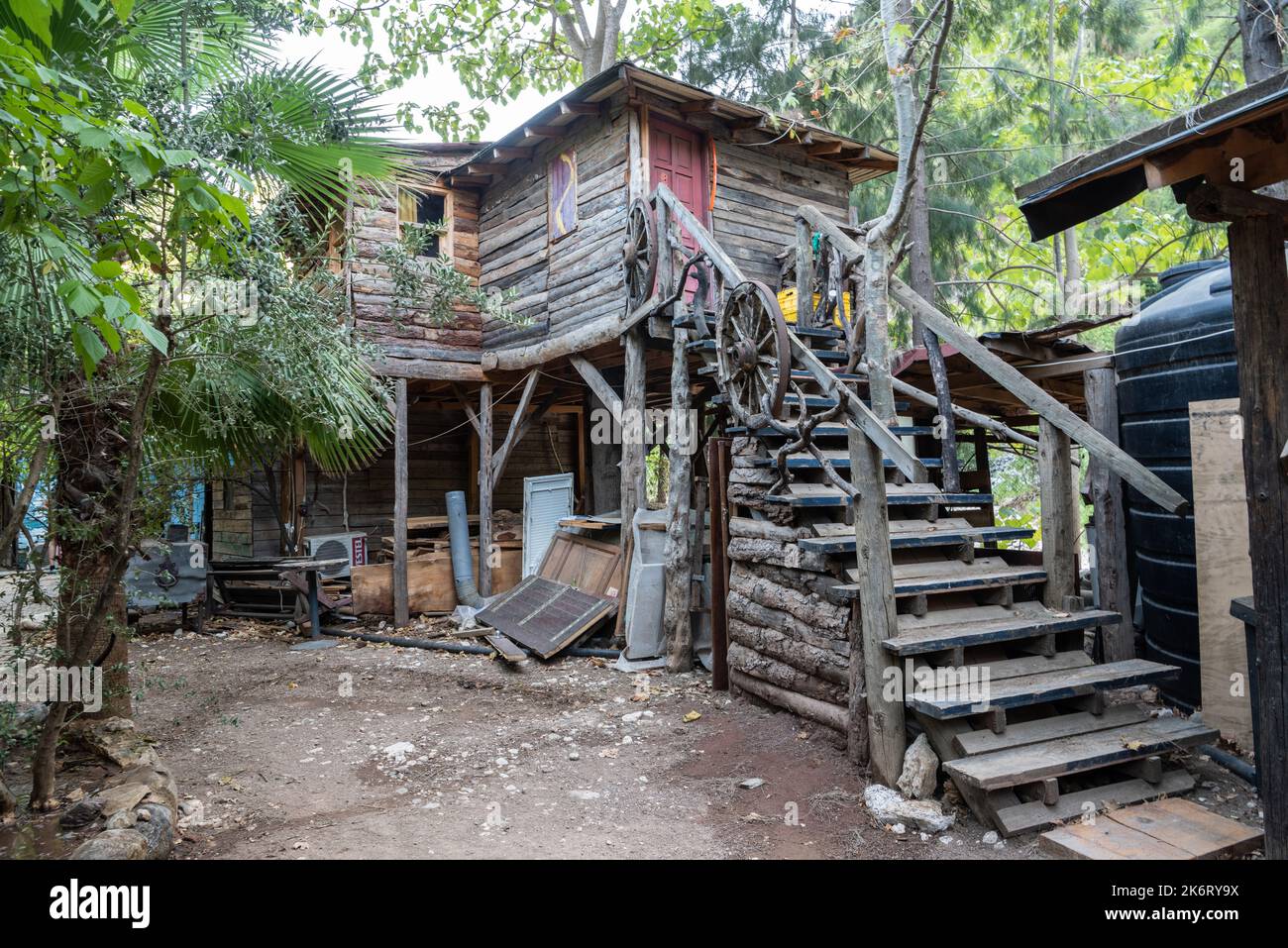 Olympos, Antalya, Turkey – August 16, 2021. Wooden shacks of Kadir’s ...