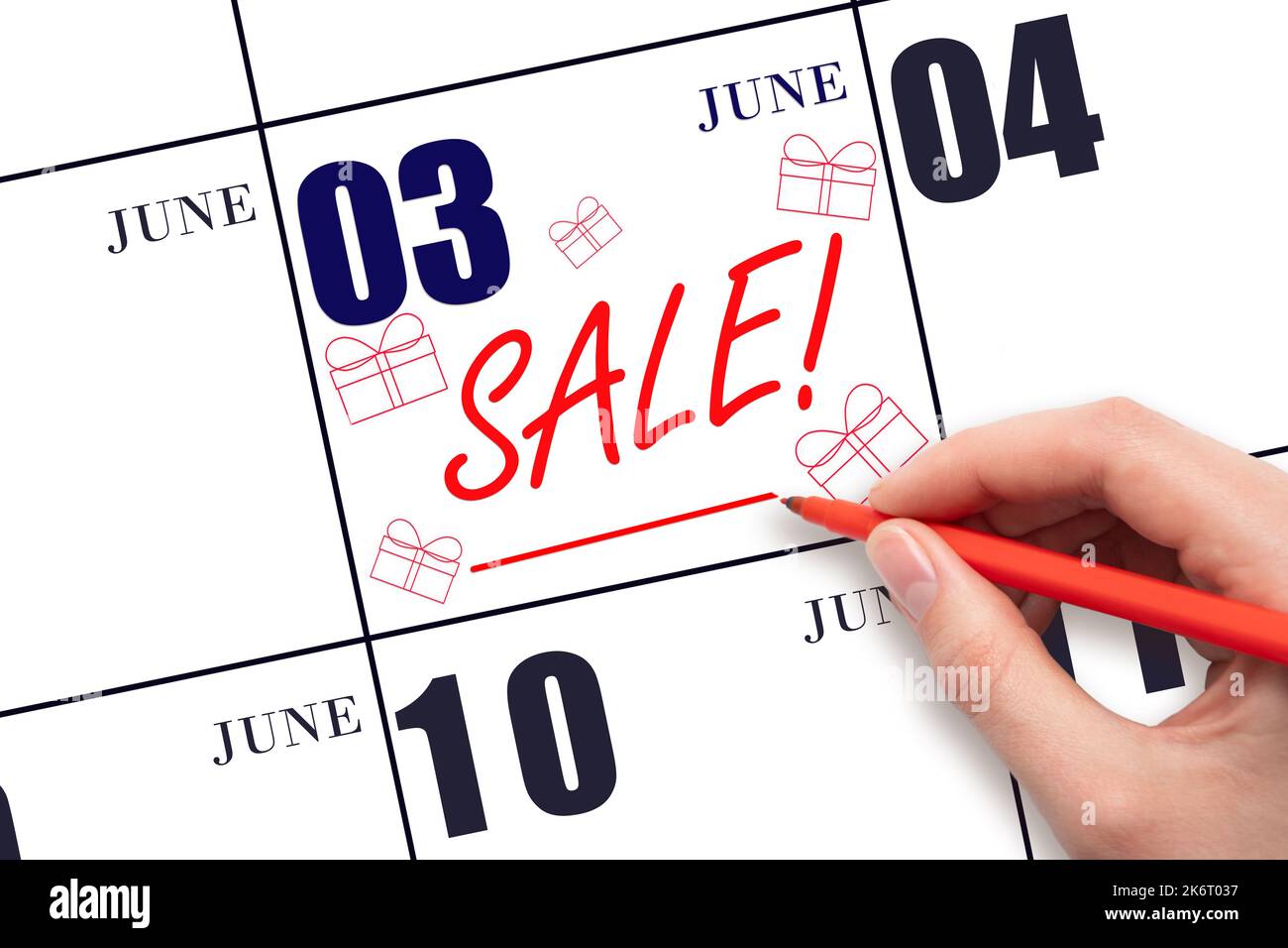 3rd day of June. Hand writing text SALE and drawing gift boxes on ...