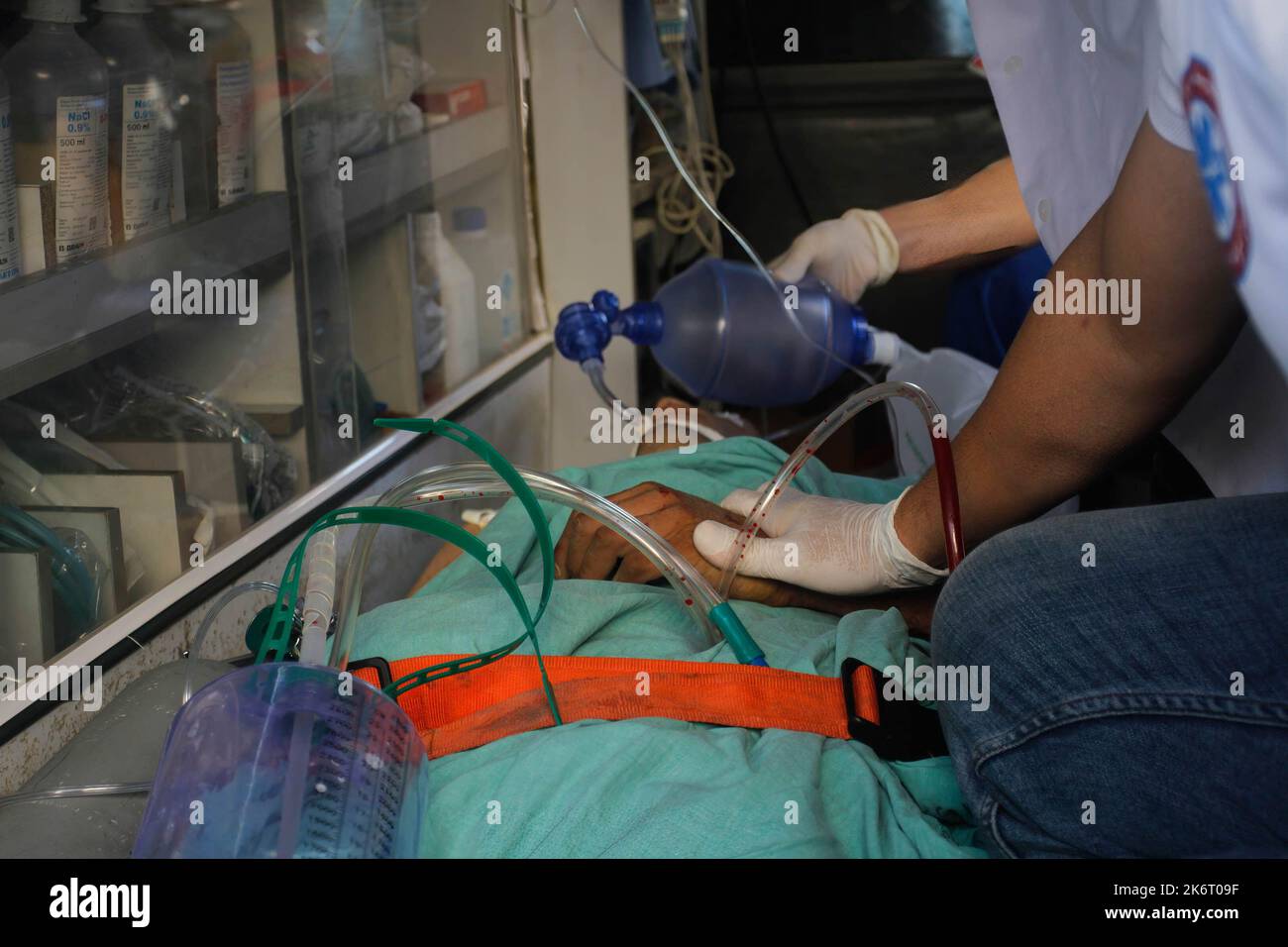 Palestinian paramedics transport an injured Palestinian Mujahid Daoud ...