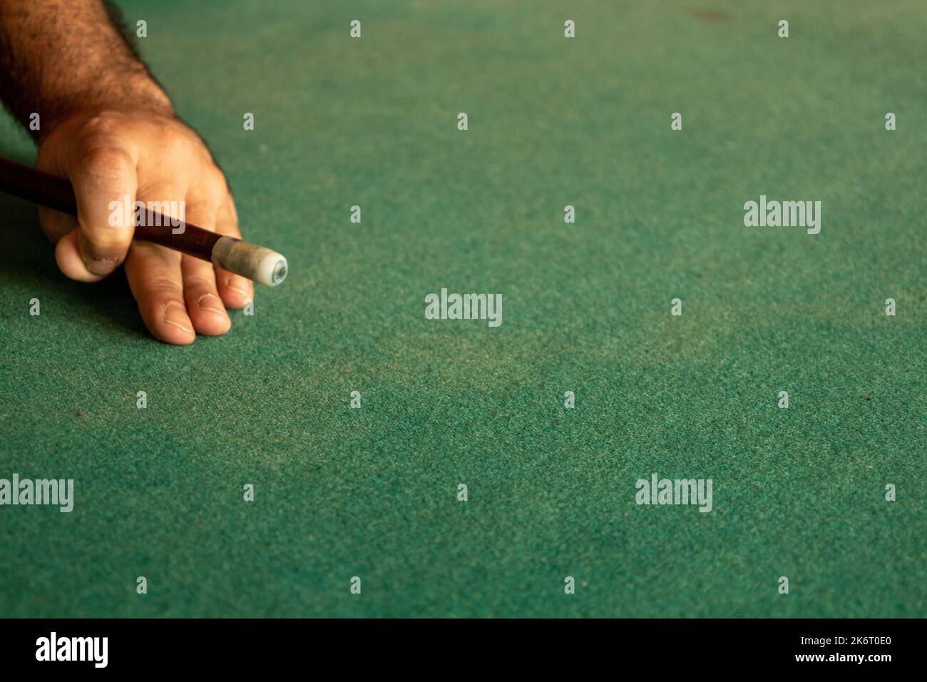 Bar game with balls and a stick on a pool table. Entertainment with ...