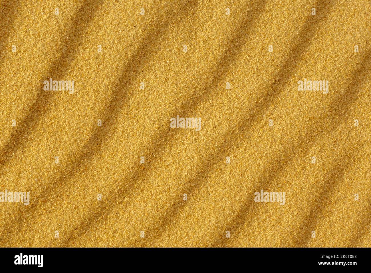 Yellow wavy sand texture close up, beautiful natural natural background ...