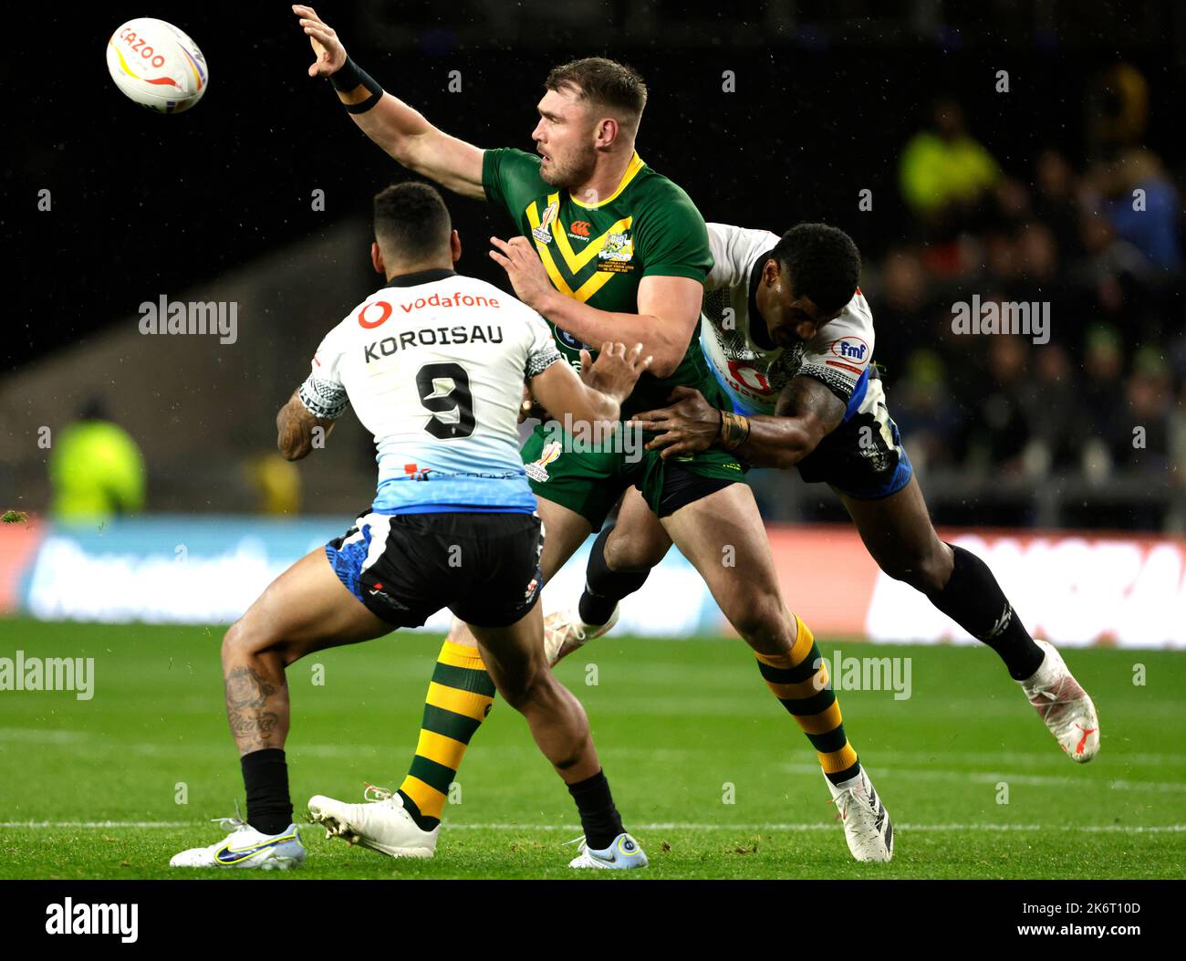 Australia's Angus Crichton (centre) attempts to hold the ball from ...