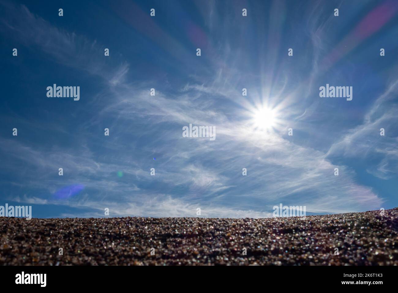 The beach and the sky with beautiful rays of sun. Landscape for leisure ...