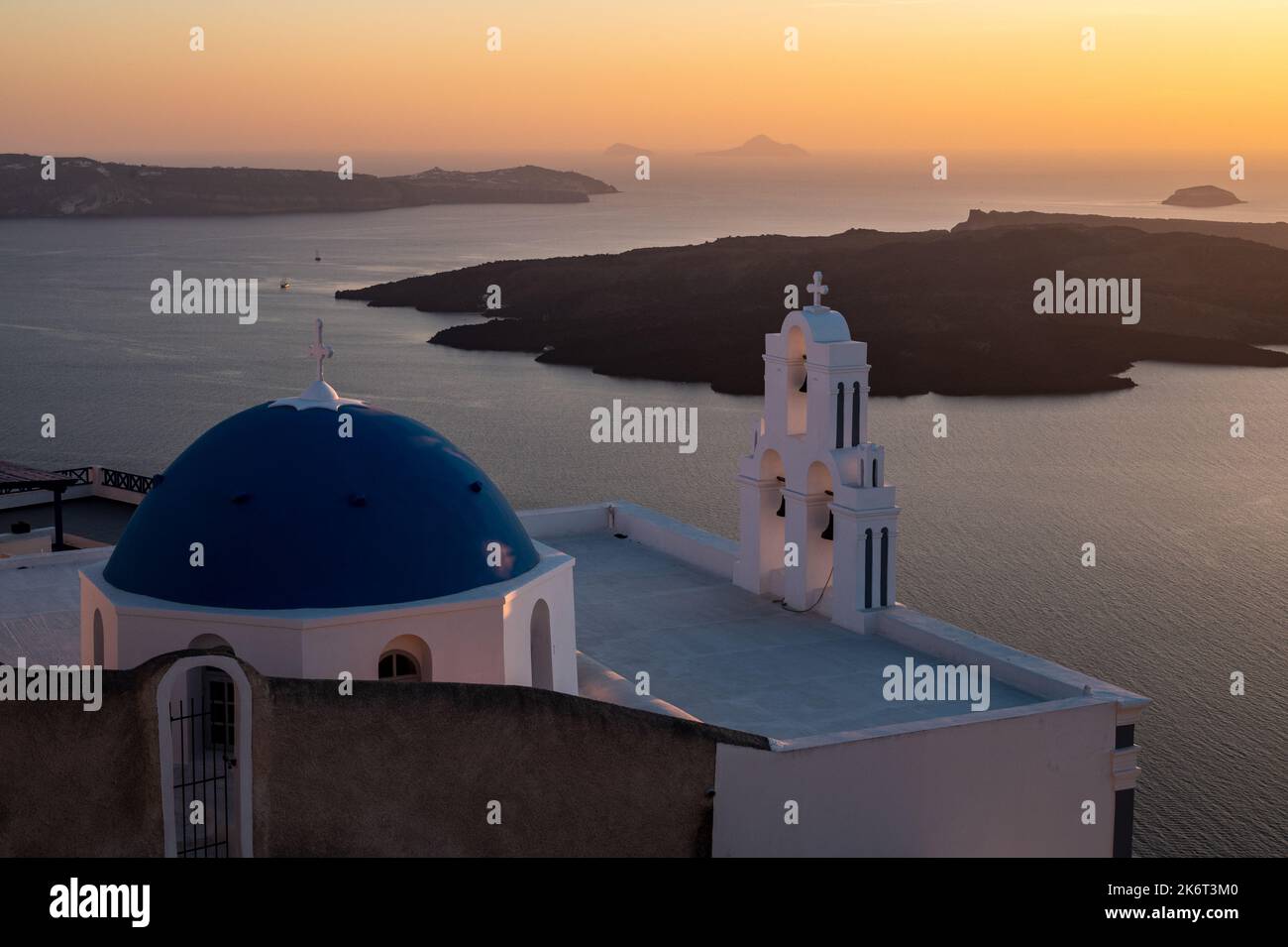 View of the sunset with The Three Bells of Fira, officially known as ...