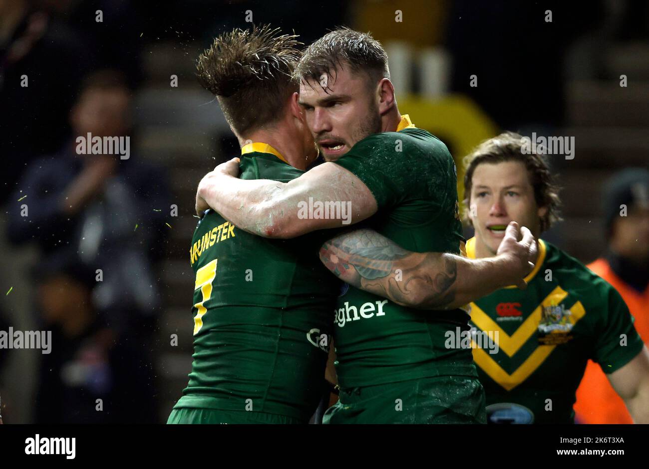 Australia's Angus Crichton (centre) celebrates scoring his side's third ...