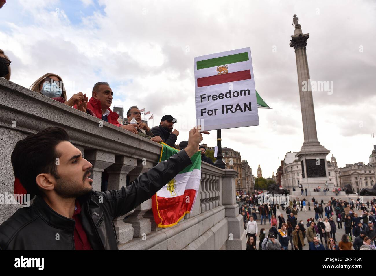 London, England, UK. 15th Oct, 2022. Protester holds a placard which ...