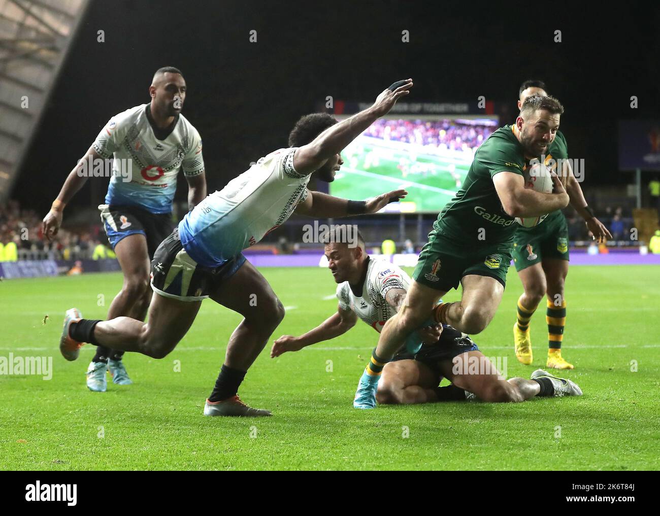 Australia's James Tedesco scores his side's sixth try of the game ...
