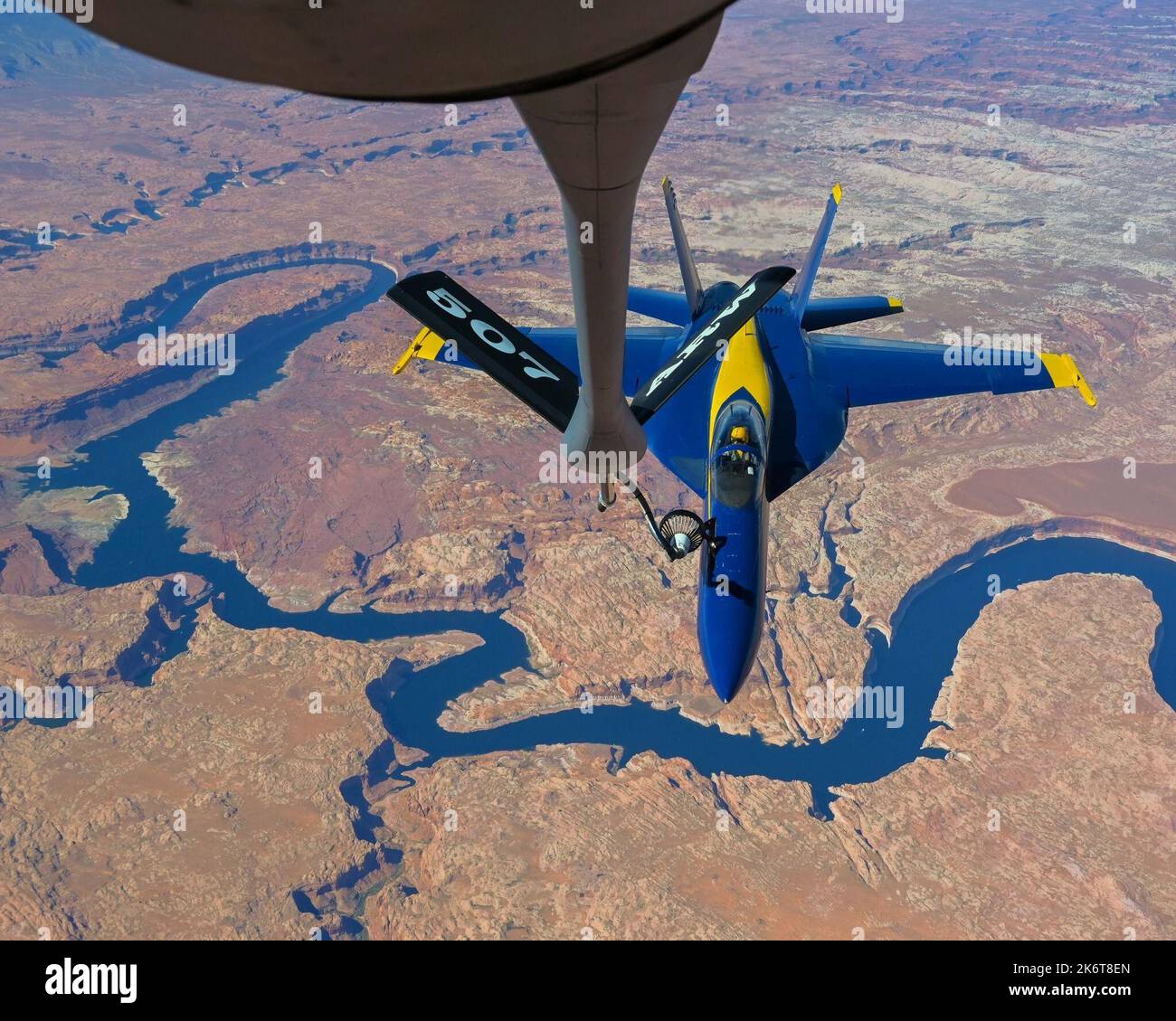 A U.S. Navy Blue Angel F/A-18E Super Hornet receives fuel from the ...