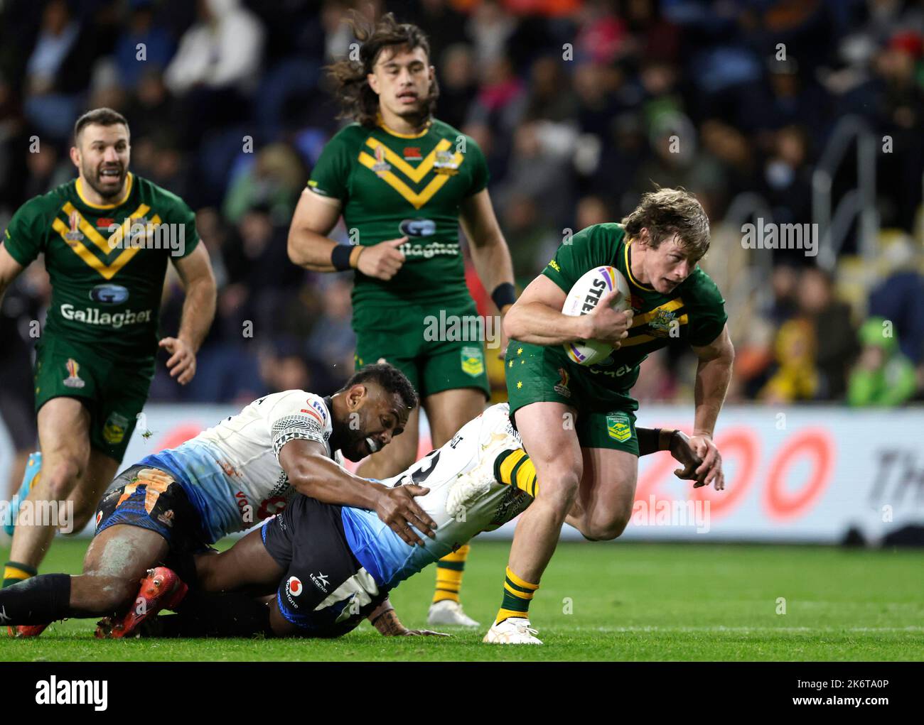 Australia's Harry Grant (right) breaks clear during the Rugby League ...
