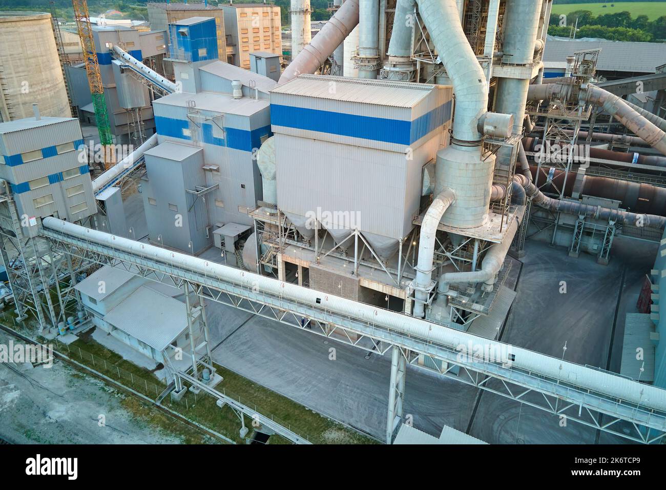 Aerial view of cement factory with high concrete plant structure and ...
