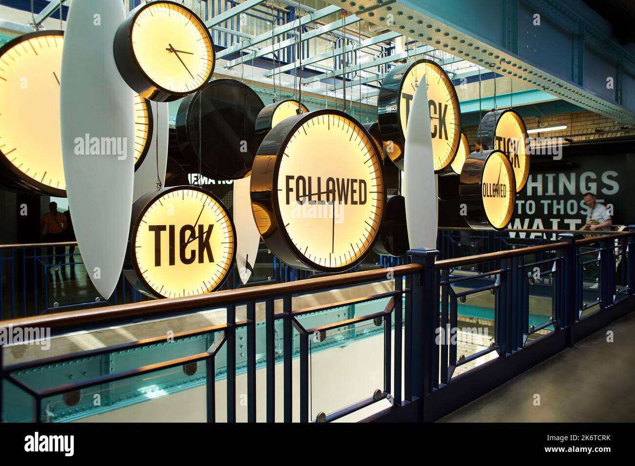 Clocks with inscriptions 'tik, tok and followed'.Yellow and blue Stock ...