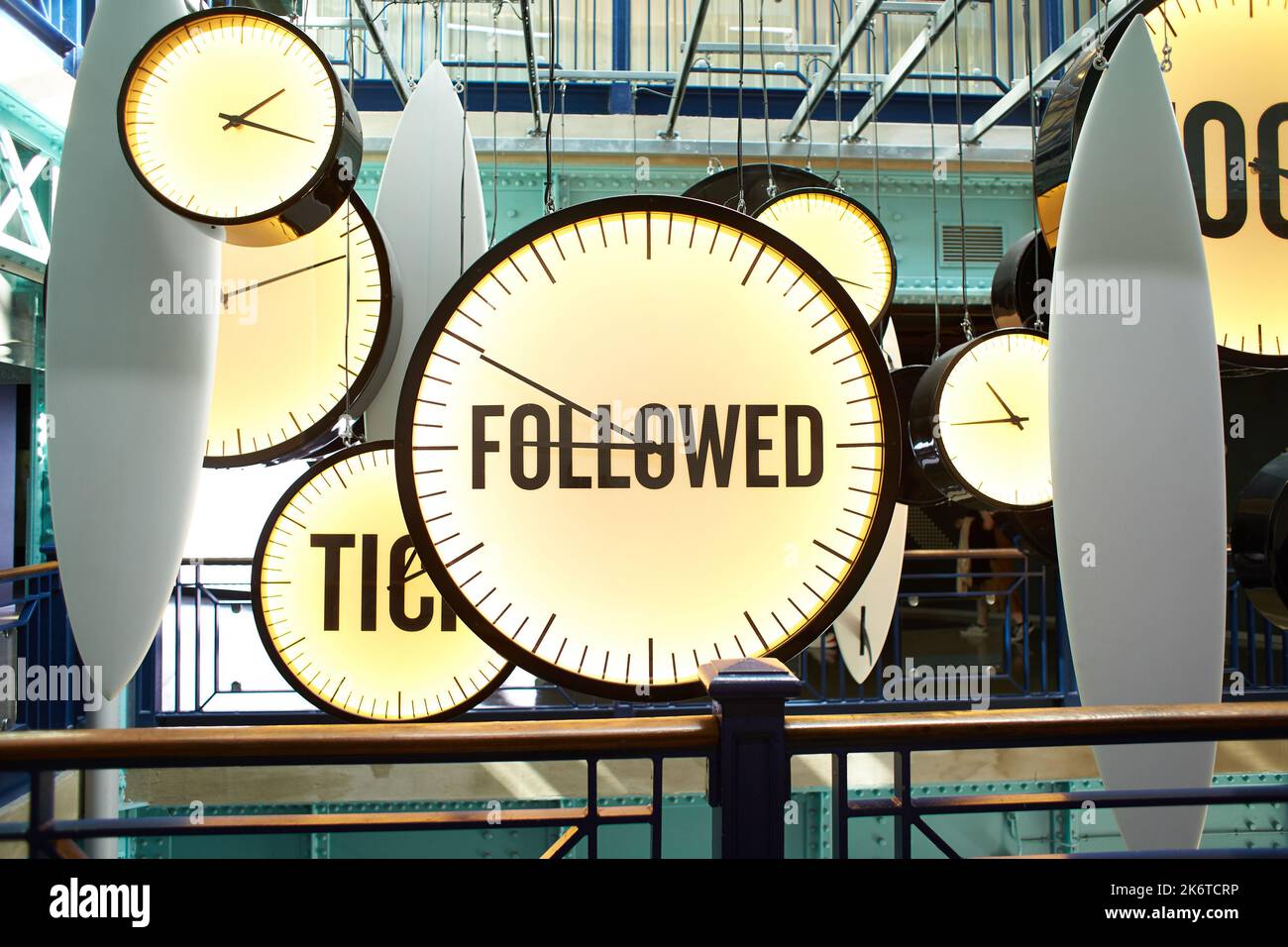 Clocks with inscriptions 'tik, tok and followed'.Yellow and blue Stock ...