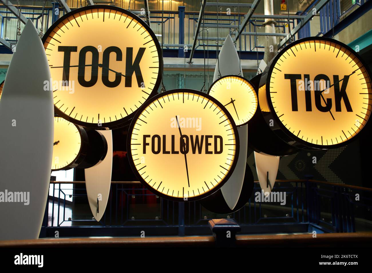 Clocks with inscriptions 'tik, tok and followed'.Yellow and blue Stock ...