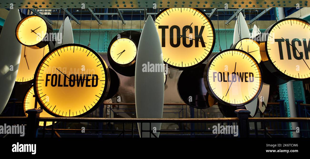 Clocks with inscriptions 'tik, tok and followed'.Yellow and blue Stock ...