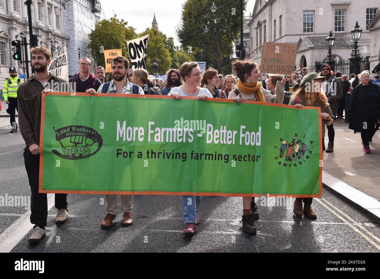 London, UK. 15th Oct, 2022. Protesters hold a banner during the rally ...