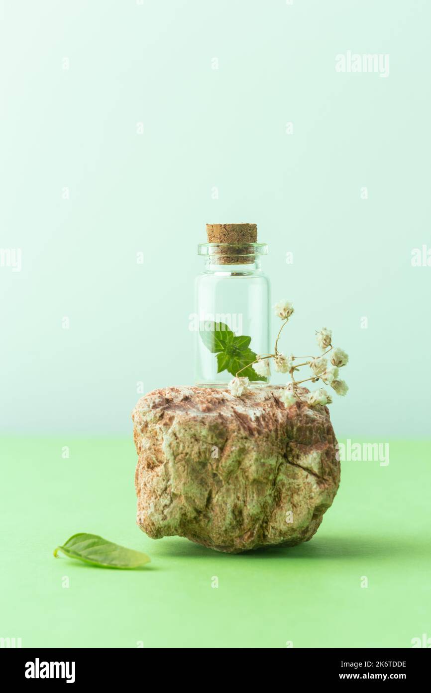 Organic, bio cosmetics healthy concept with natural plants in bottles ...