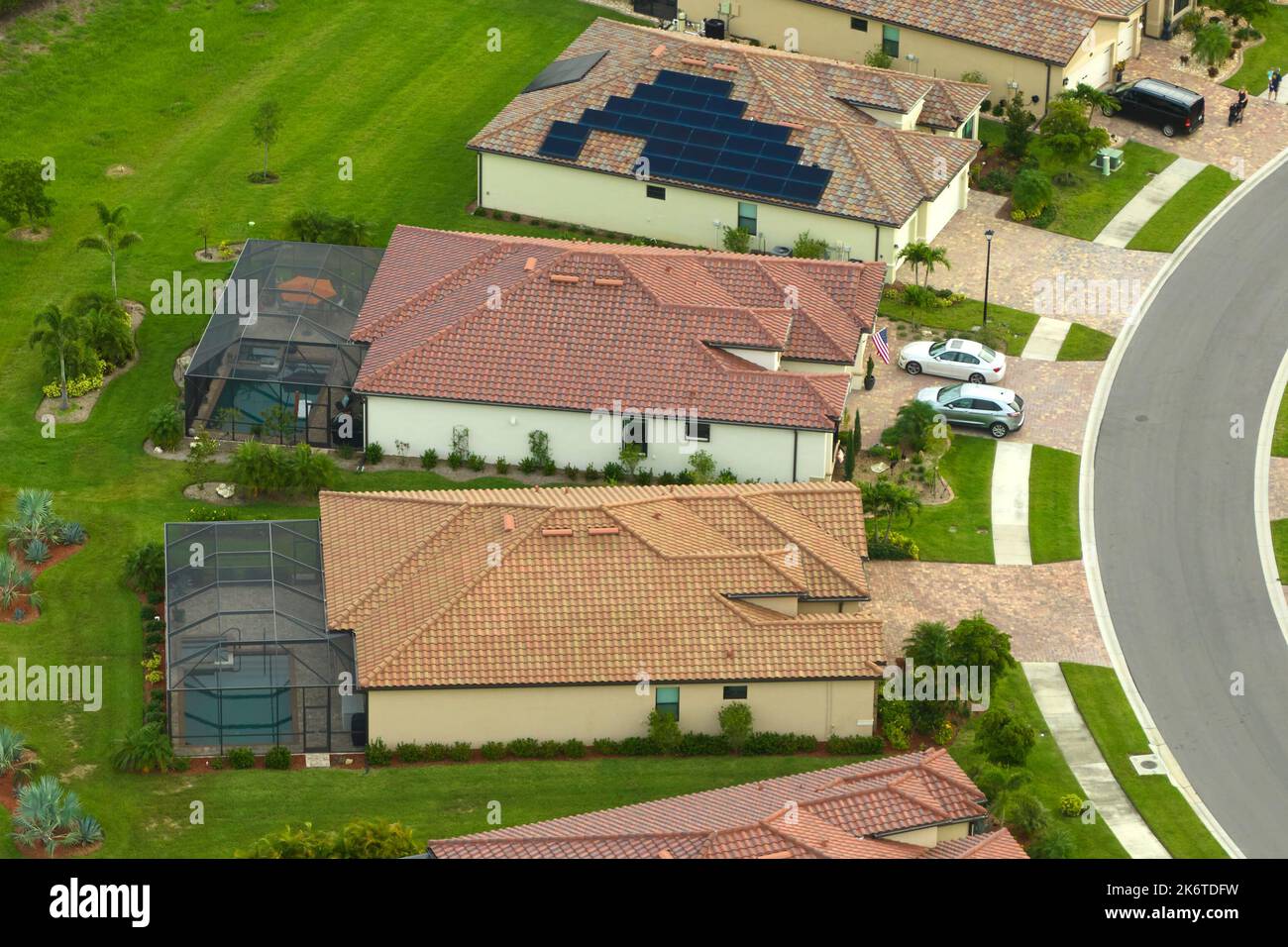 Aerial view of expensive modern houses with outside swimming pools ...