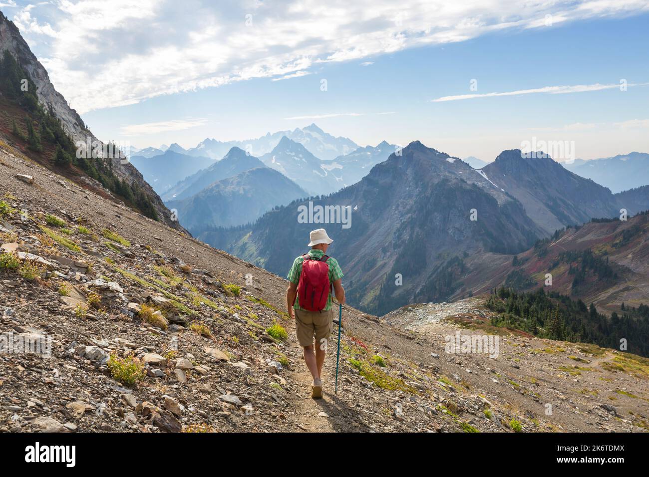 hiker in mountains on beautiful rock background Stock Photo - Alamy
