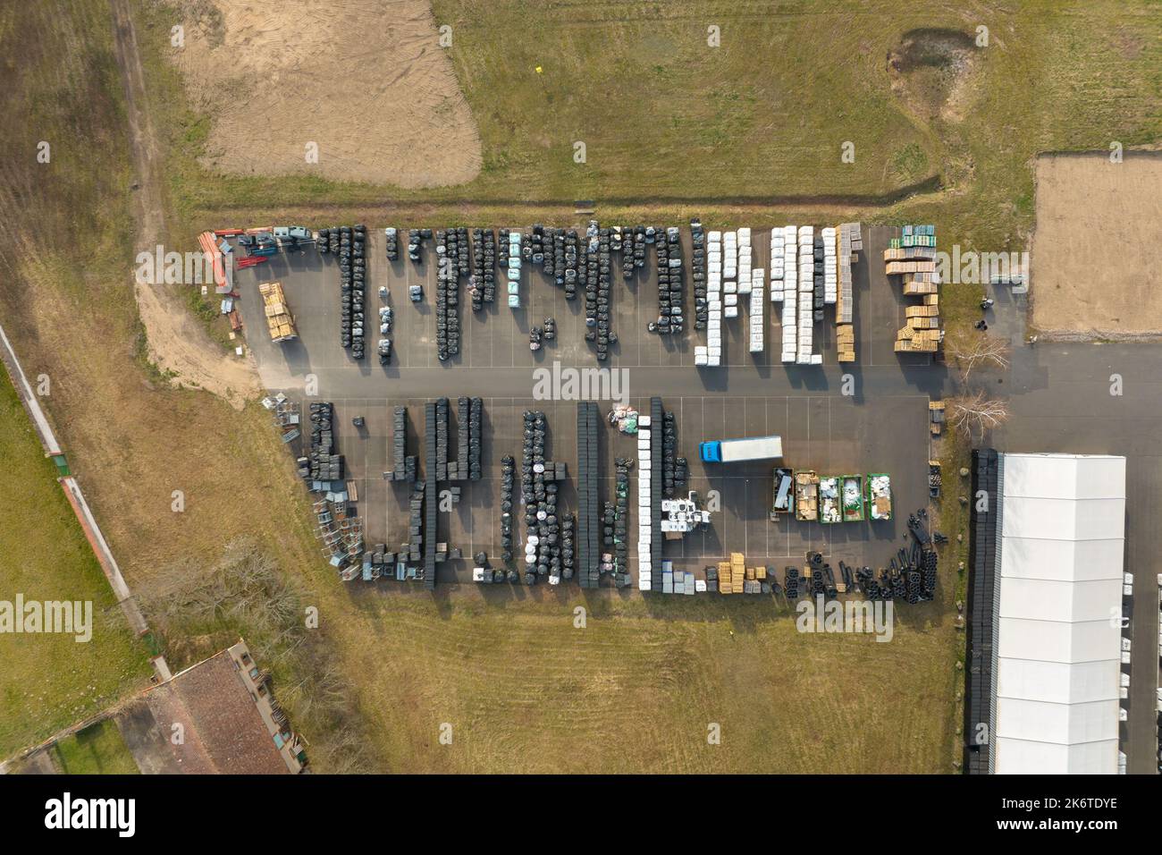 Aerial view of goods storage on warehouse yard and logistics center in ...