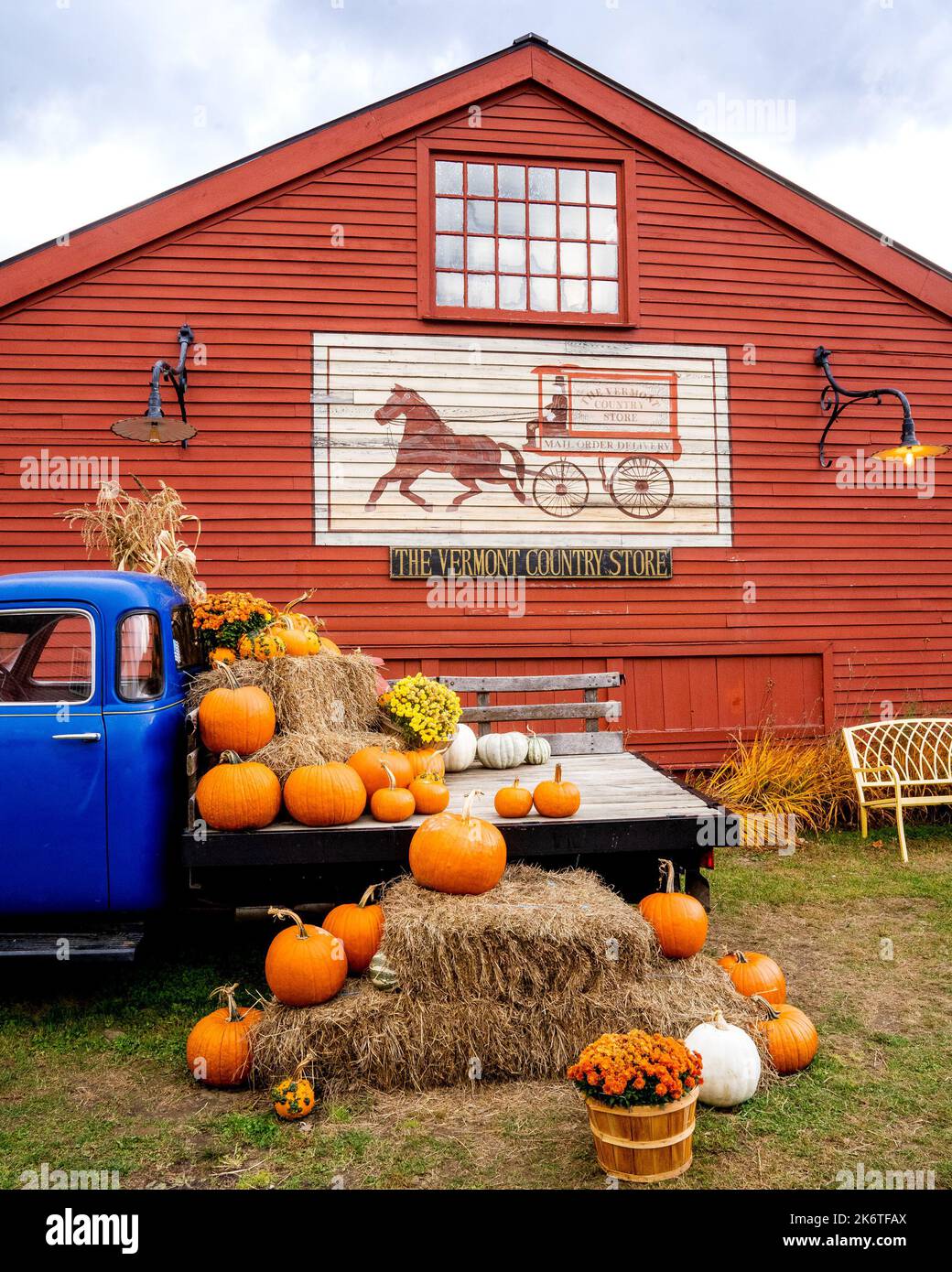 Weston, VT - USA - Oct. 7, 2022 Vertical display of pumpkins, flowers ...