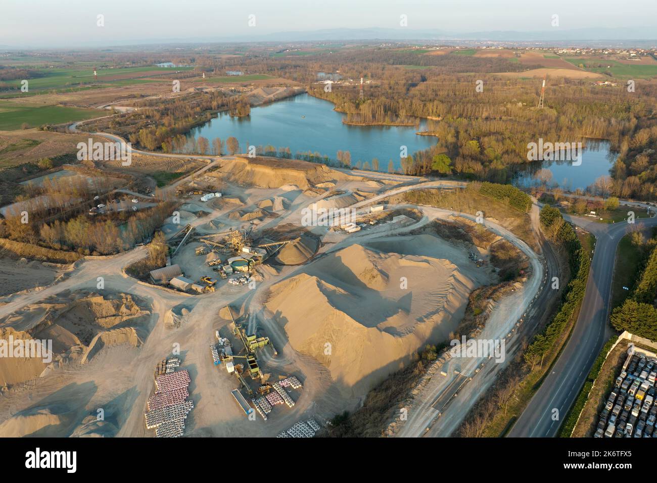 Aerial view of open pit mining site of limestone materials extraction ...