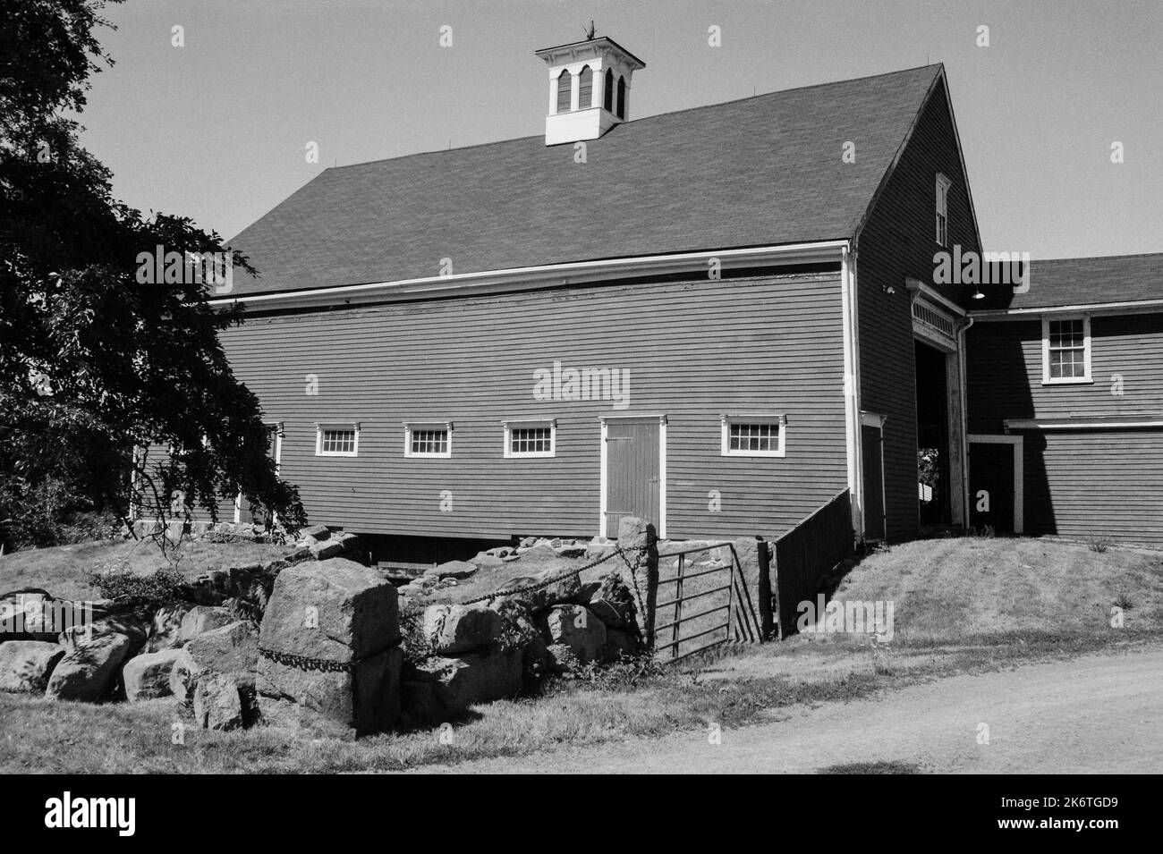 A weathered traditional wooden barn no longer in use at Cogswell Grant in historic Essex ...